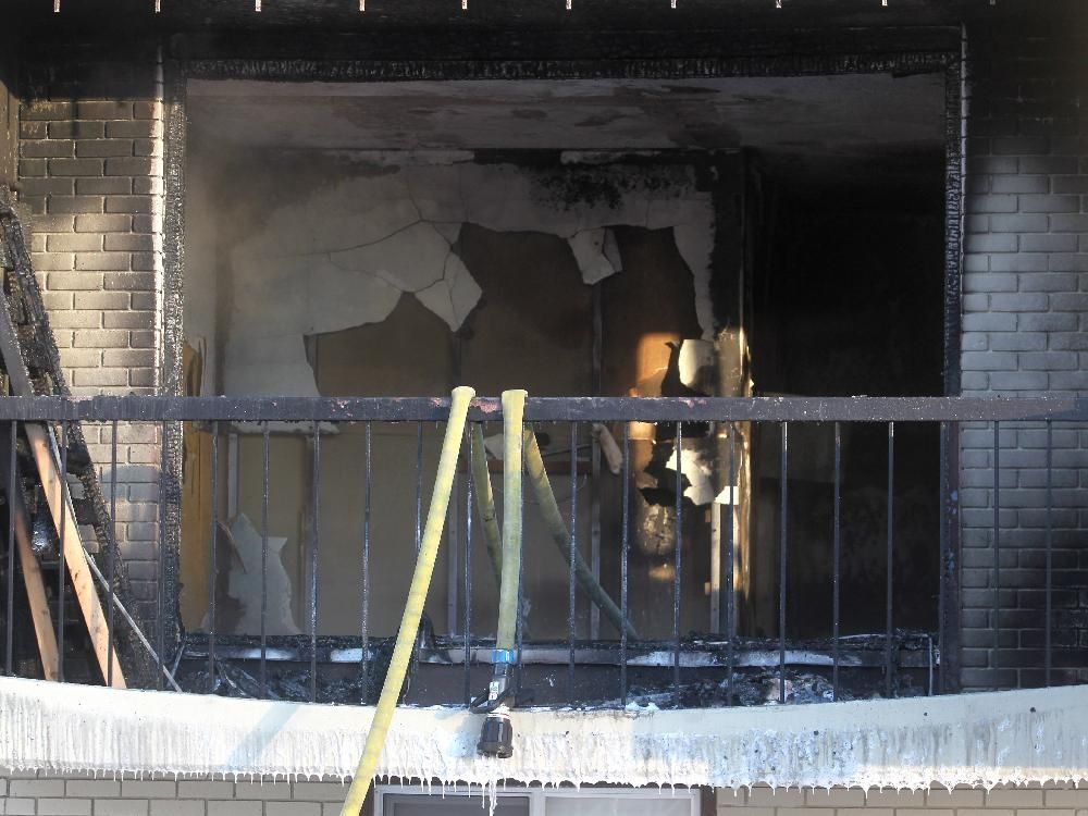 Fire crews use ladders to evacuate burning Calgary apartment building ...