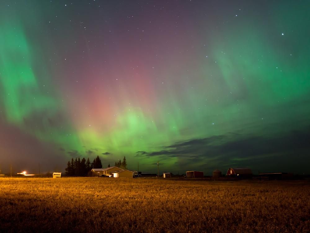 Solar storm putting on spectacular light show in Calgary night sky ...