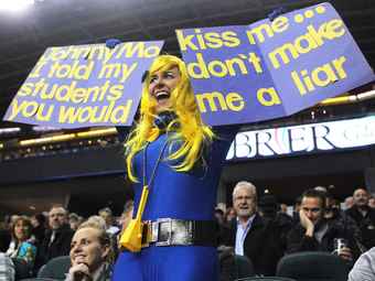 Gallery: Fan gets a kiss at the Brier | Calgary Herald