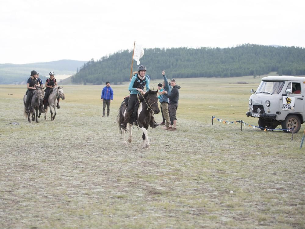 Former Calgary journalist finishes world's longest horse race with ...