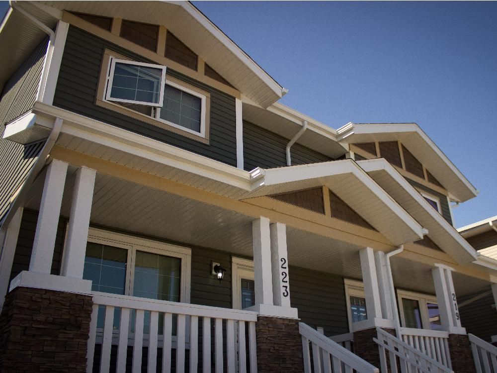 14 families move into new homes on World Habitat Day | Calgary Herald