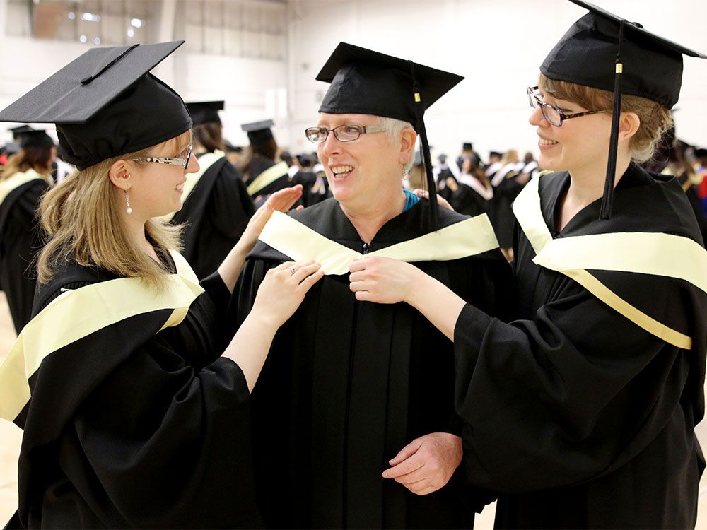 Mom, adult daughters share stage at U of C graduation | Calgary Herald
