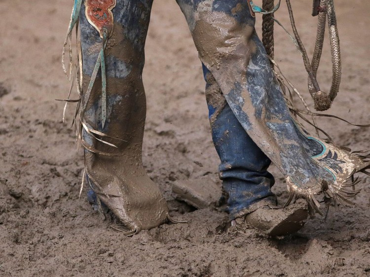 Gallery: A muddy Saturday at the Calgary Stampede Rodeo | Calgary Herald