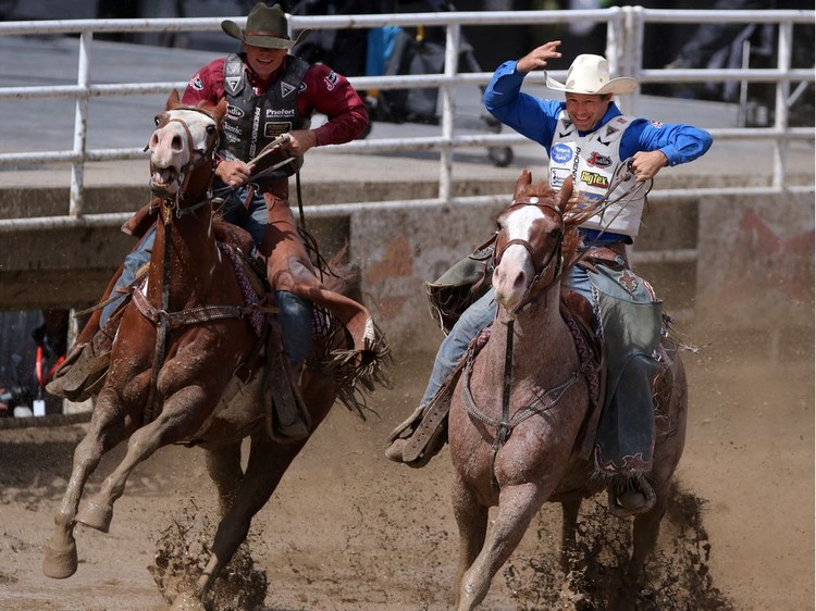 Gallery: A muddy Saturday at the Calgary Stampede Rodeo | Calgary Herald