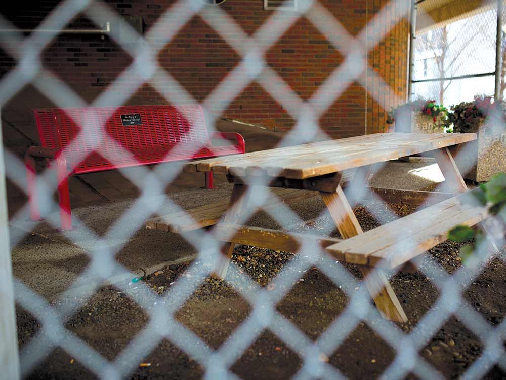 Our Town: What reason is there for a bench behind a fence? | Calgary Herald