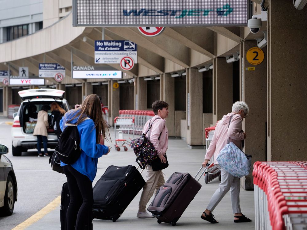 WestJet Airlines Ltd. warns of delays due to computer system outage ...