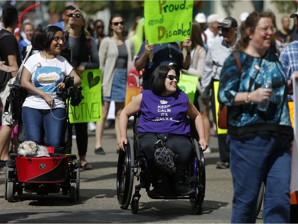 Thousands join disability pride parade in downtown Calgary | Calgary Herald