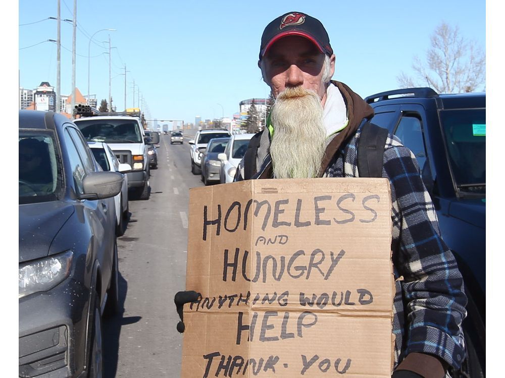 Panhandling at Calgary's busy intersections a 'calculated risk ...