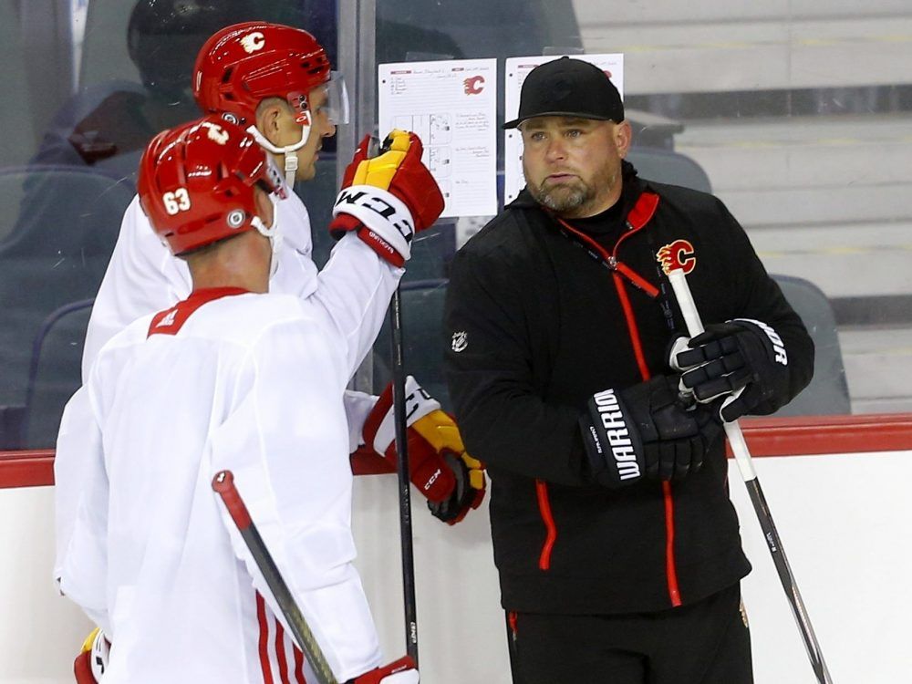 Flames and assistant coach Marc Savard mutually agree to part ways ...