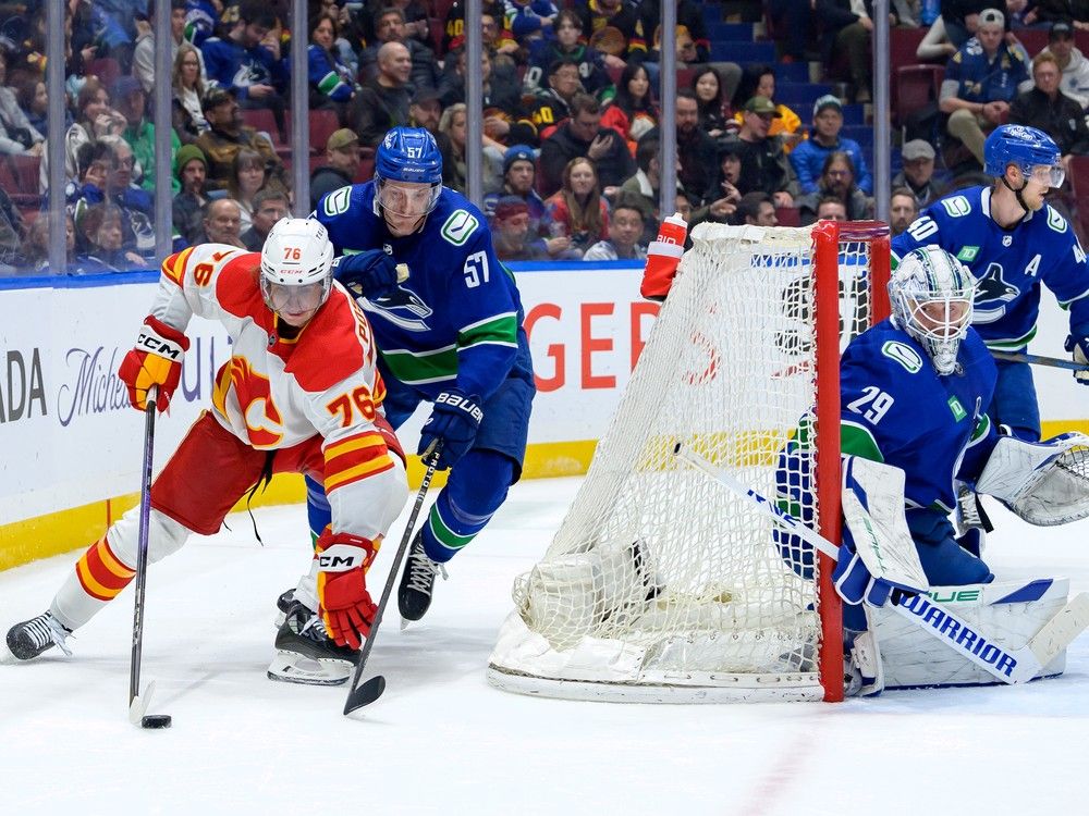 Flames put up a fight but fall to Canucks as playoff hopes dwindle ...