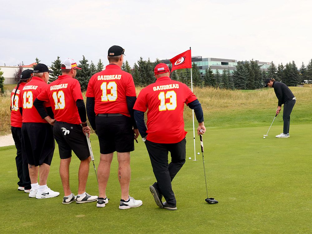 Flames players grateful Calgarians rise for Johnny Gaudreau, family ...
