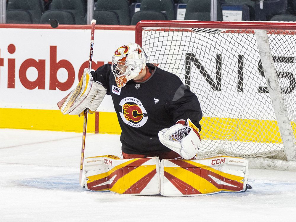 Flames remain tight-lipped on opening-night netminding plan | Calgary ...