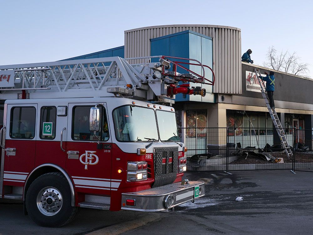 Fire rips through roof of northeast Calgary strip mall | Calgary Herald