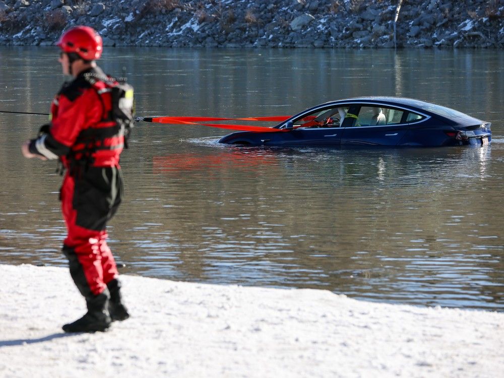 Tesla sinks on stock markets … and in Bow River | Calgary Herald