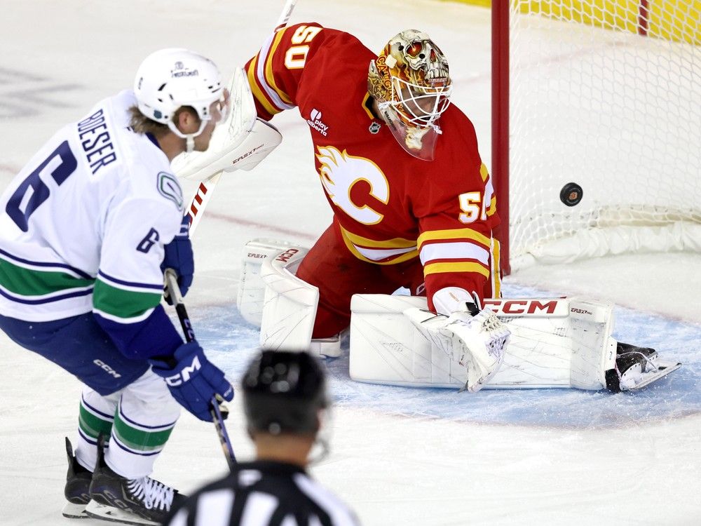 Devin Cooley wins Flames’ backup goalie job, team waives three players ...