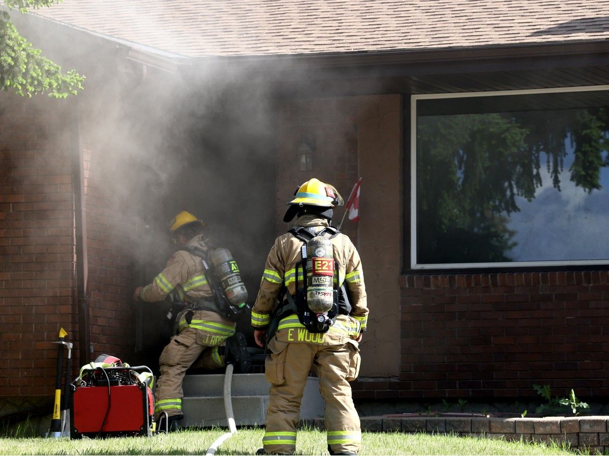 Three people and pet dogs escape Dalhousie house fire | Calgary Herald