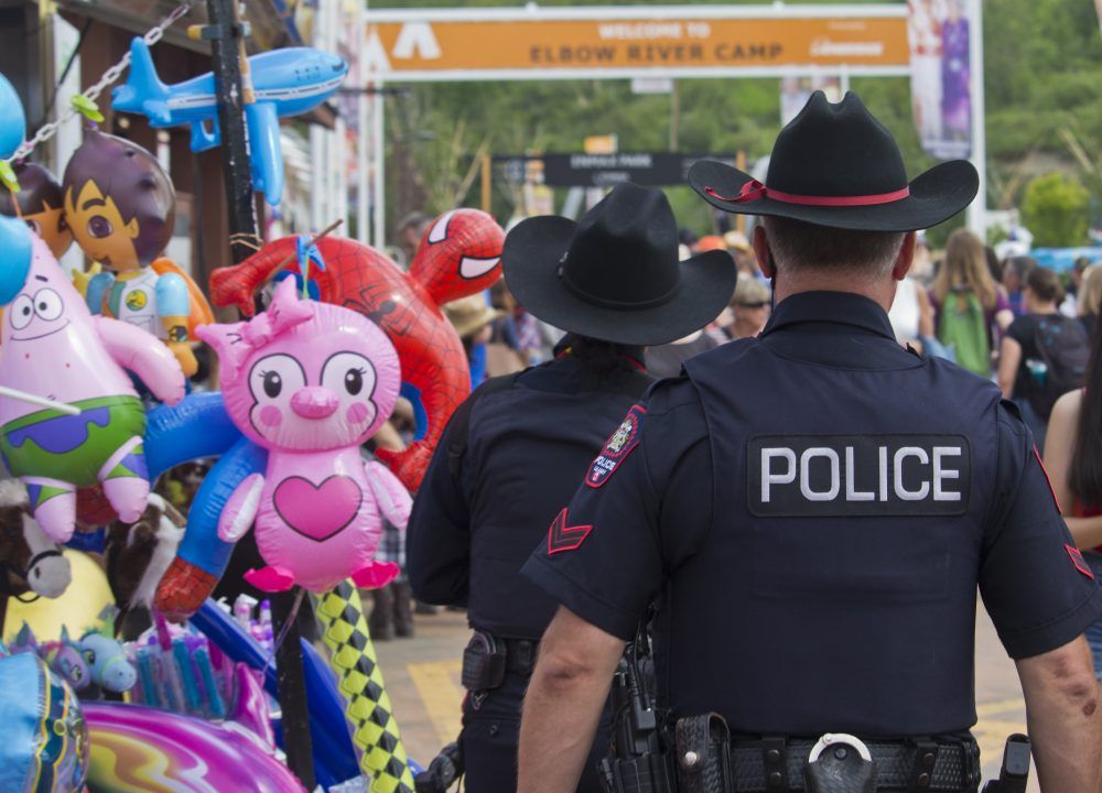 What it takes to police the Calgary Stampede, a city within a city ...