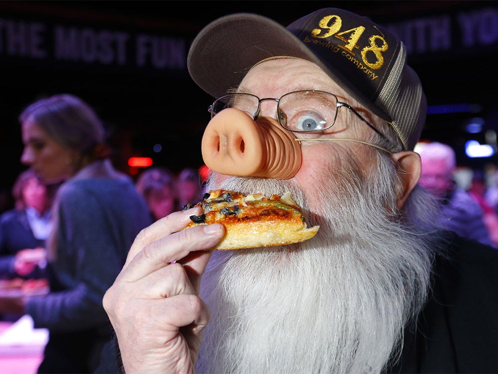Hundreds eat pizza for charity in annual Eric Francis Pizza Pigout ...