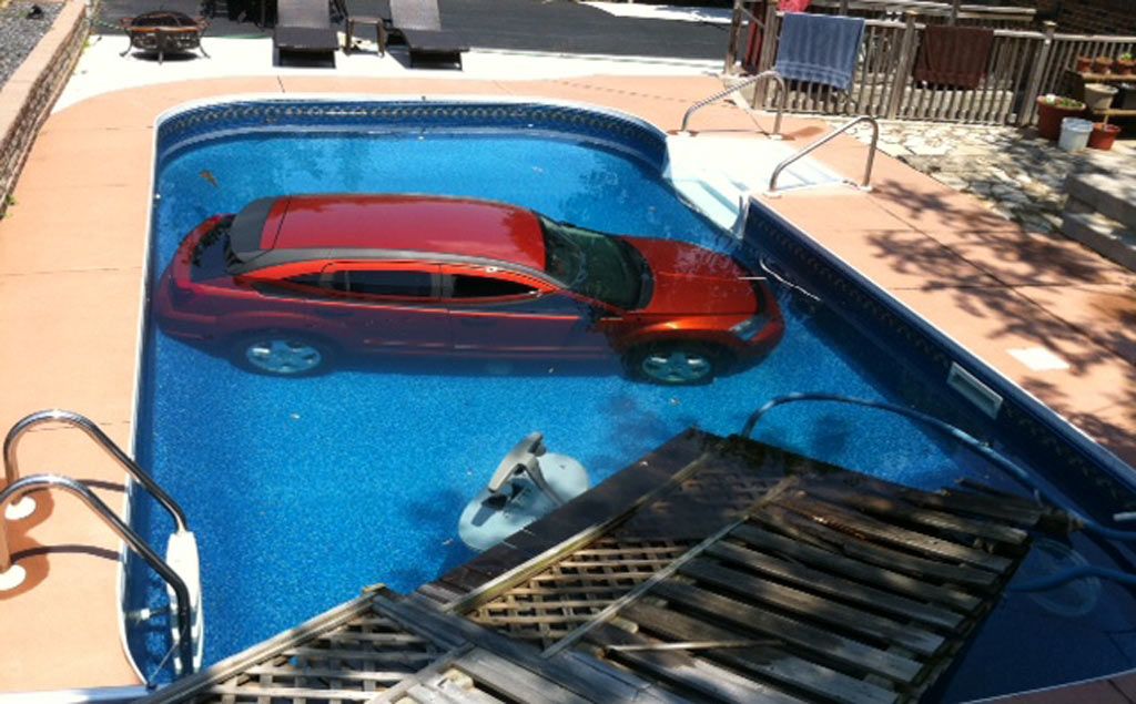 Gallery: Ontario driver backs car into swimming pool | Driving