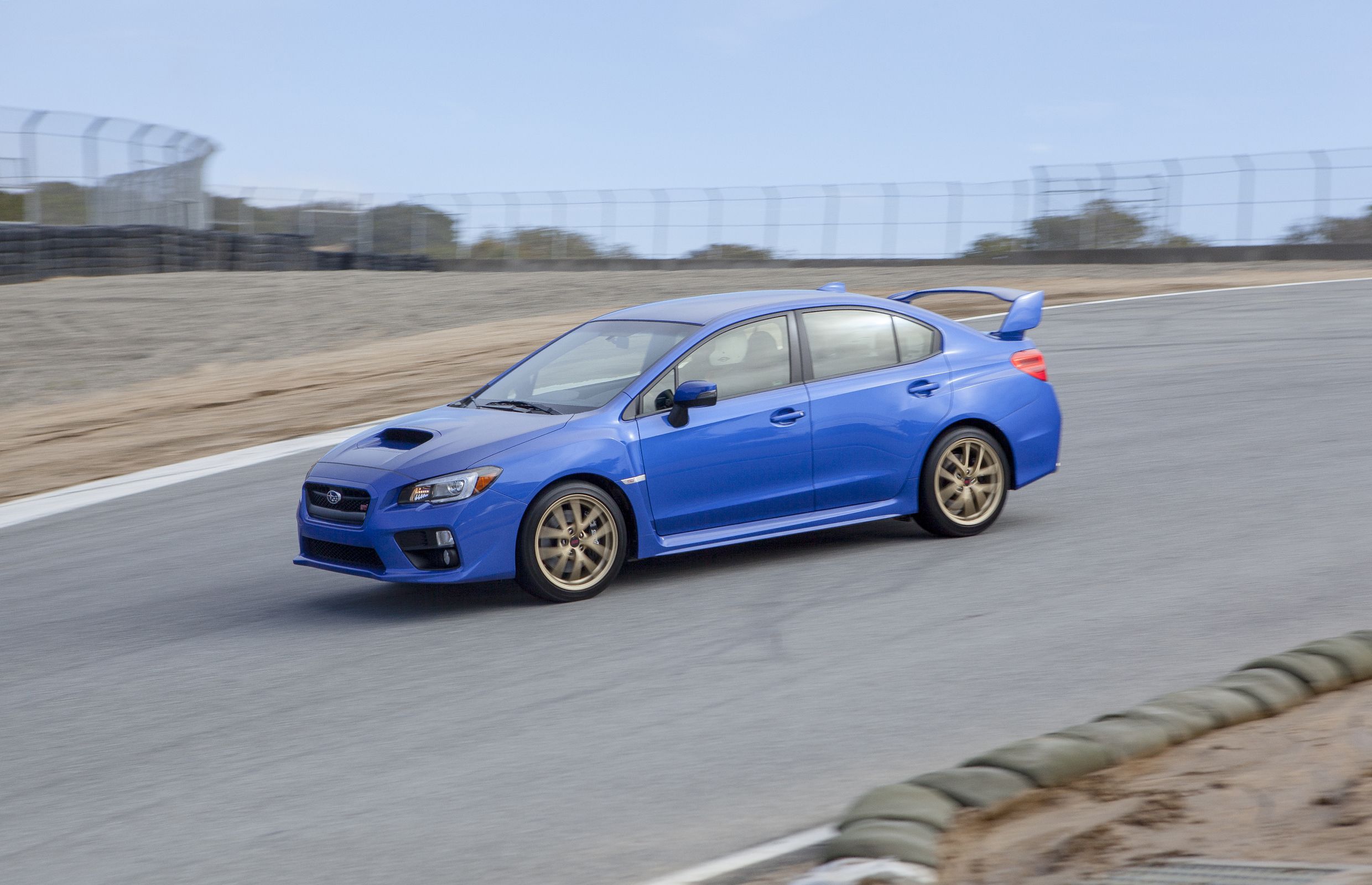 Motor Mouth: Tackling Laguna Seca with the Subaru STI | Driving