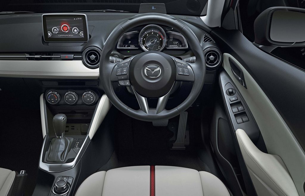 Mazda unveils redesigned 2016 Mazda2 hatchback | Driving