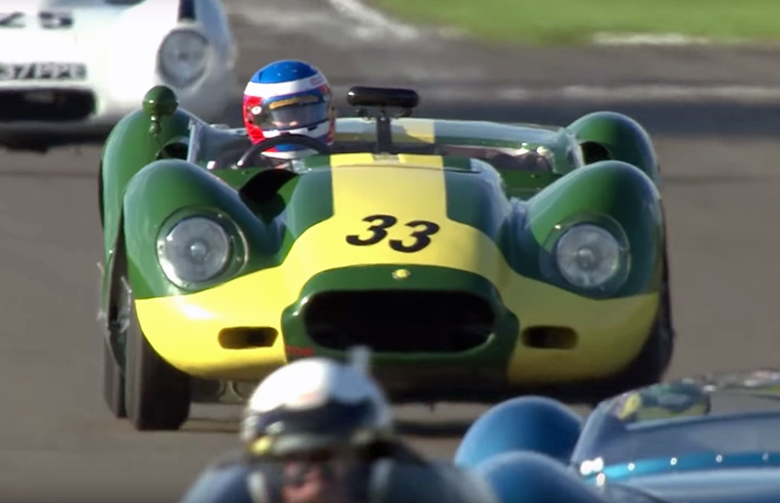 Watch this 1959 Lister-Jaguar slingshot from last to first at Goodwood ...