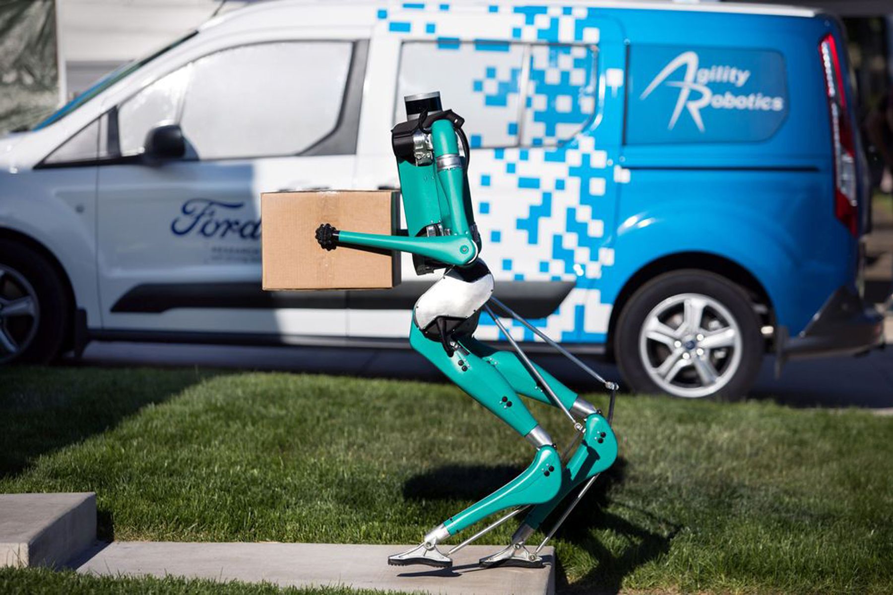 Ford prototypes robot that unfolds from back of truck to deliver ...