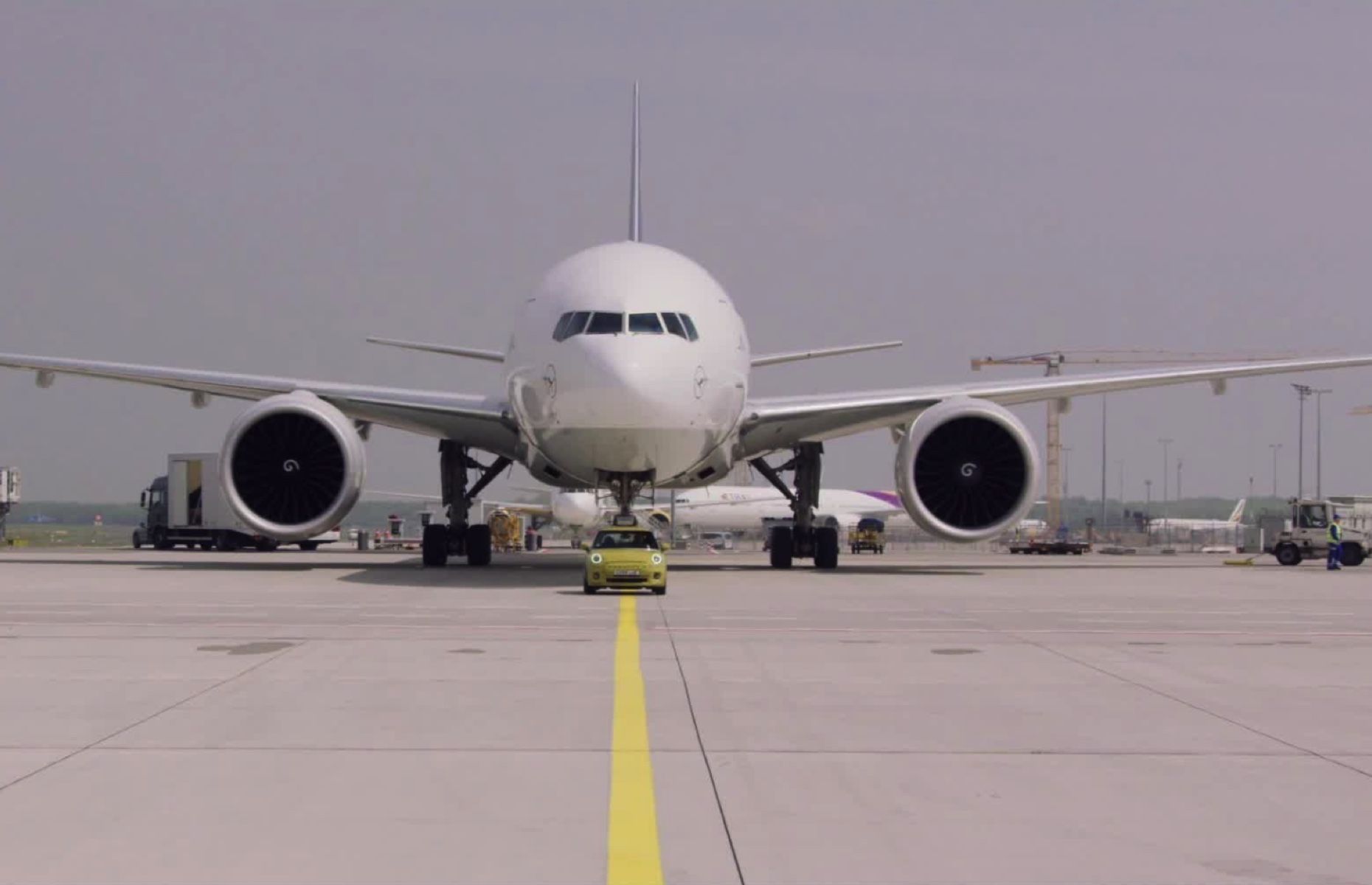 Mini teases electric Cooper SE by using it to—pull a cargo plane ...