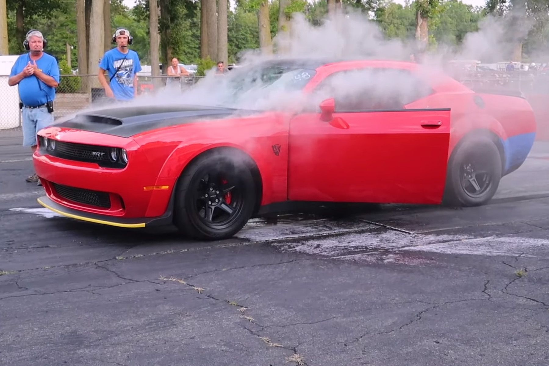 Watch: Ridiculous feud sees Dodge Challenger Demon left to burn after ...