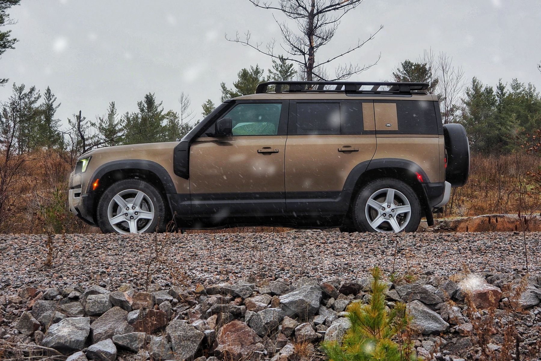 A tale of two luxury SUVs: Cadillac Escalade vs. Land Rover Defender ...