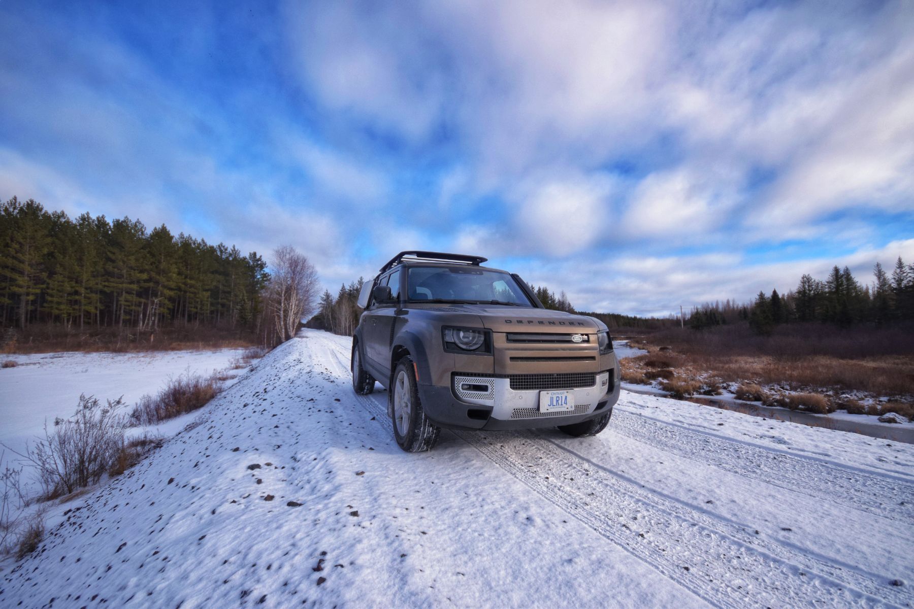 A tale of two luxury SUVs: Cadillac Escalade vs. Land Rover Defender ...