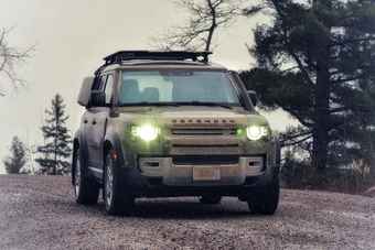 A tale of two luxury SUVs: Cadillac Escalade vs. Land Rover Defender ...