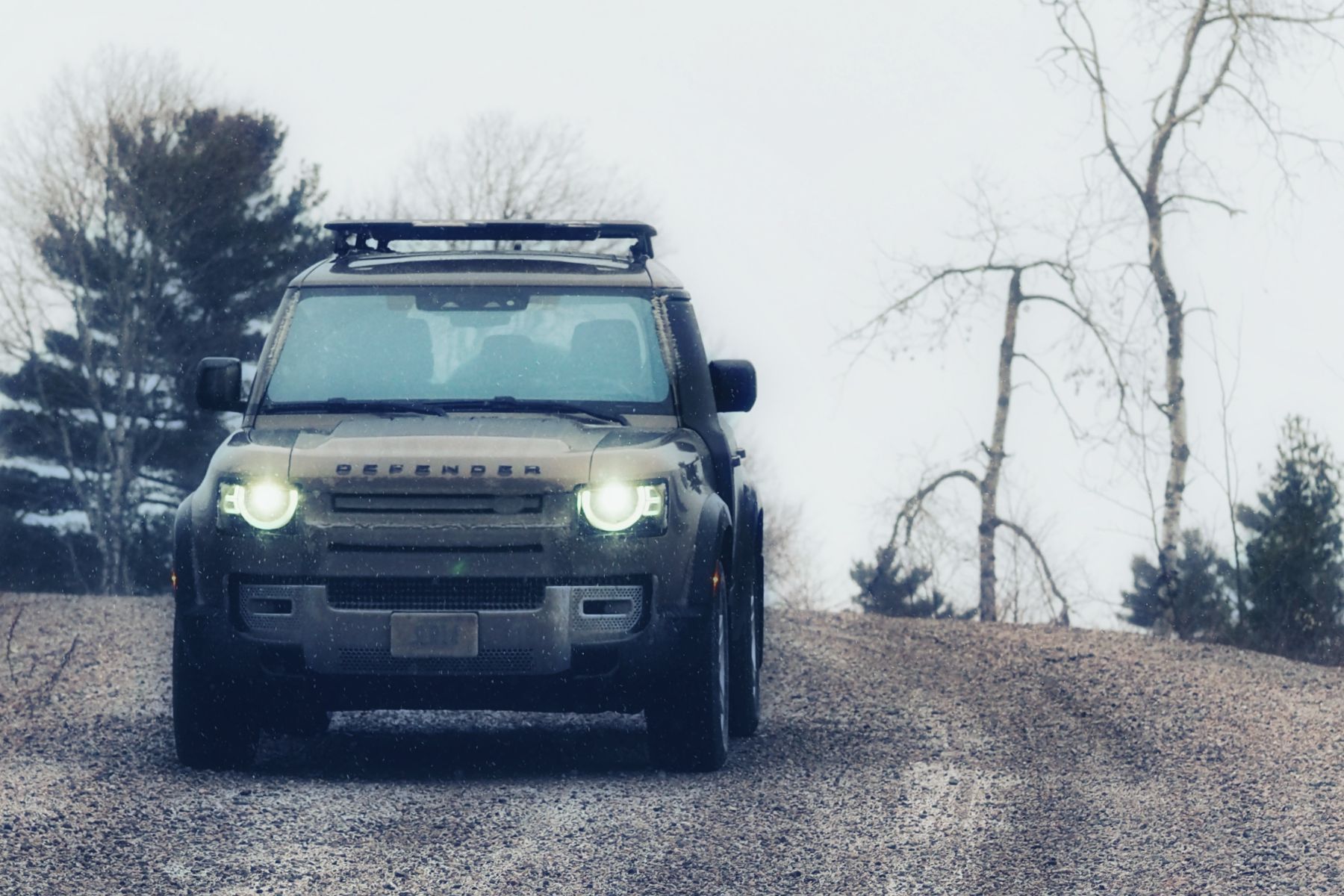 A tale of two luxury SUVs: Cadillac Escalade vs. Land Rover Defender ...