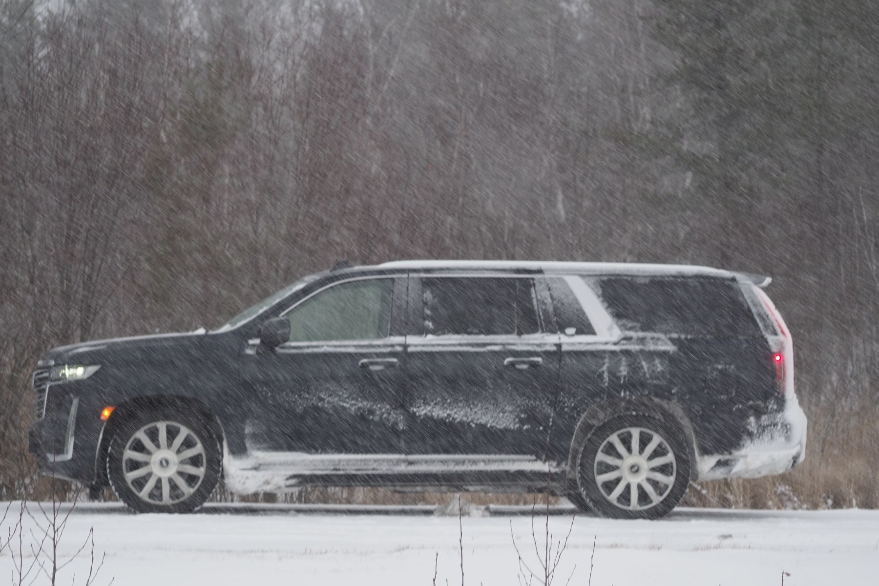 A tale of two luxury SUVs: Cadillac Escalade vs. Land Rover Defender ...