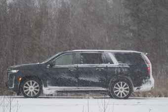 A tale of two luxury SUVs: Cadillac Escalade vs. Land Rover Defender ...