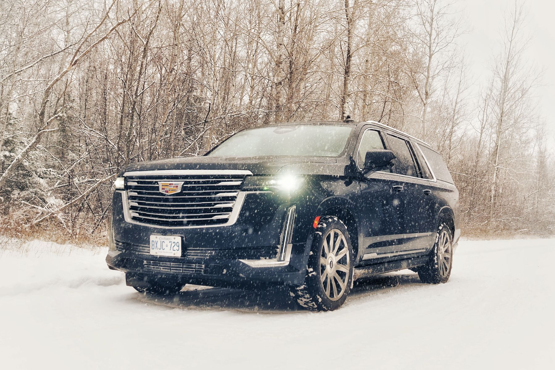 A tale of two luxury SUVs: Cadillac Escalade vs. Land Rover Defender ...