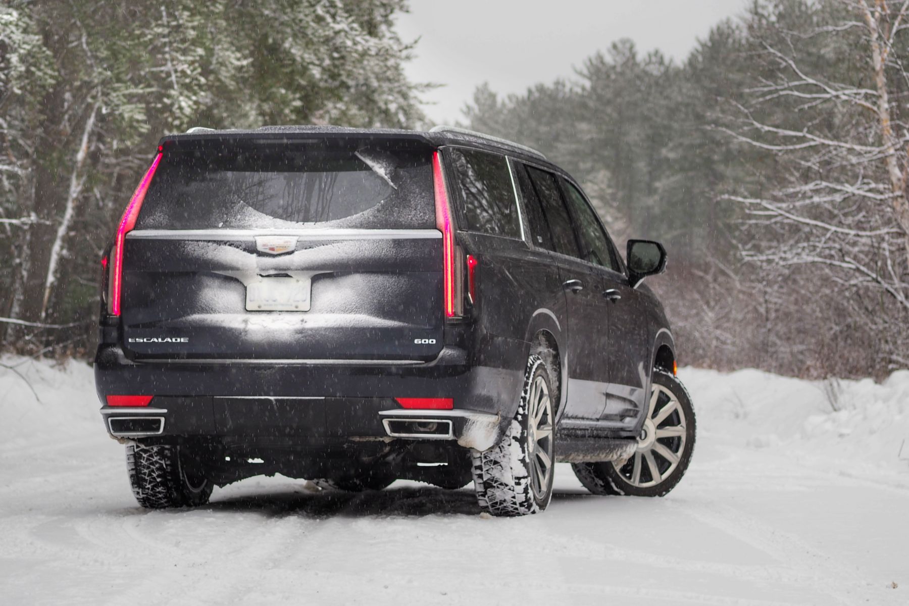 A tale of two luxury SUVs: Cadillac Escalade vs. Land Rover Defender ...