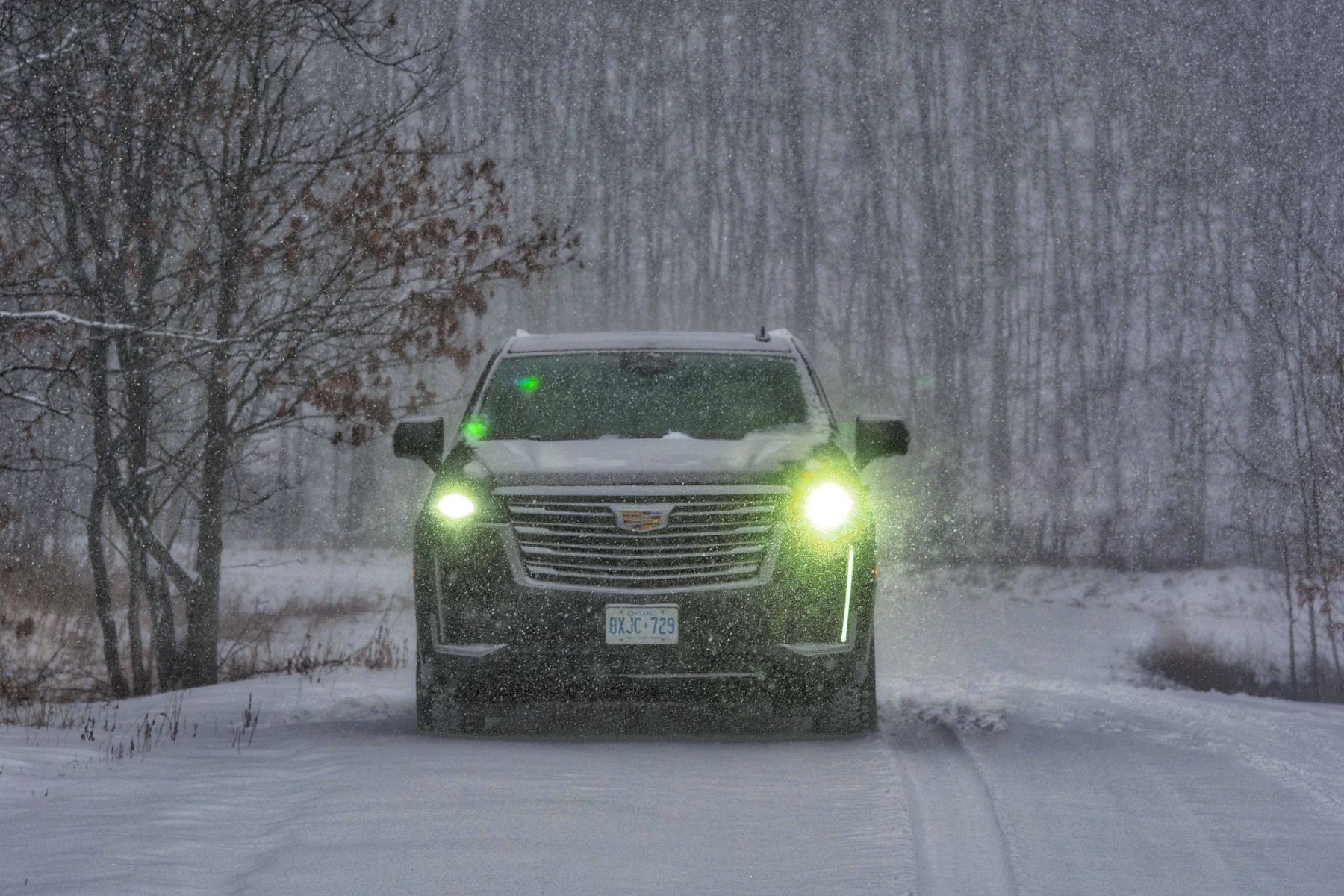 A tale of two luxury SUVs: Cadillac Escalade vs. Land Rover Defender ...