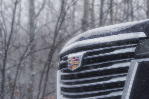 A tale of two luxury SUVs: Cadillac Escalade vs. Land Rover Defender ...