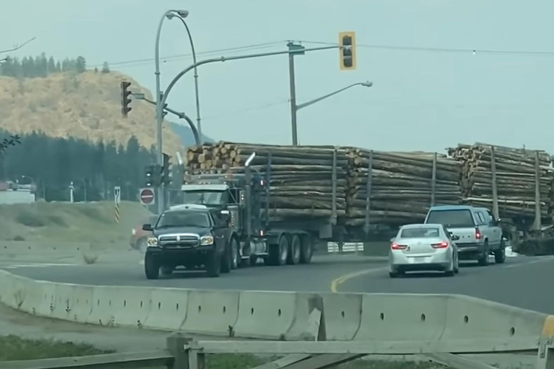 Did this Ram just rescue a loaded logging truck from a breakdown? | Driving