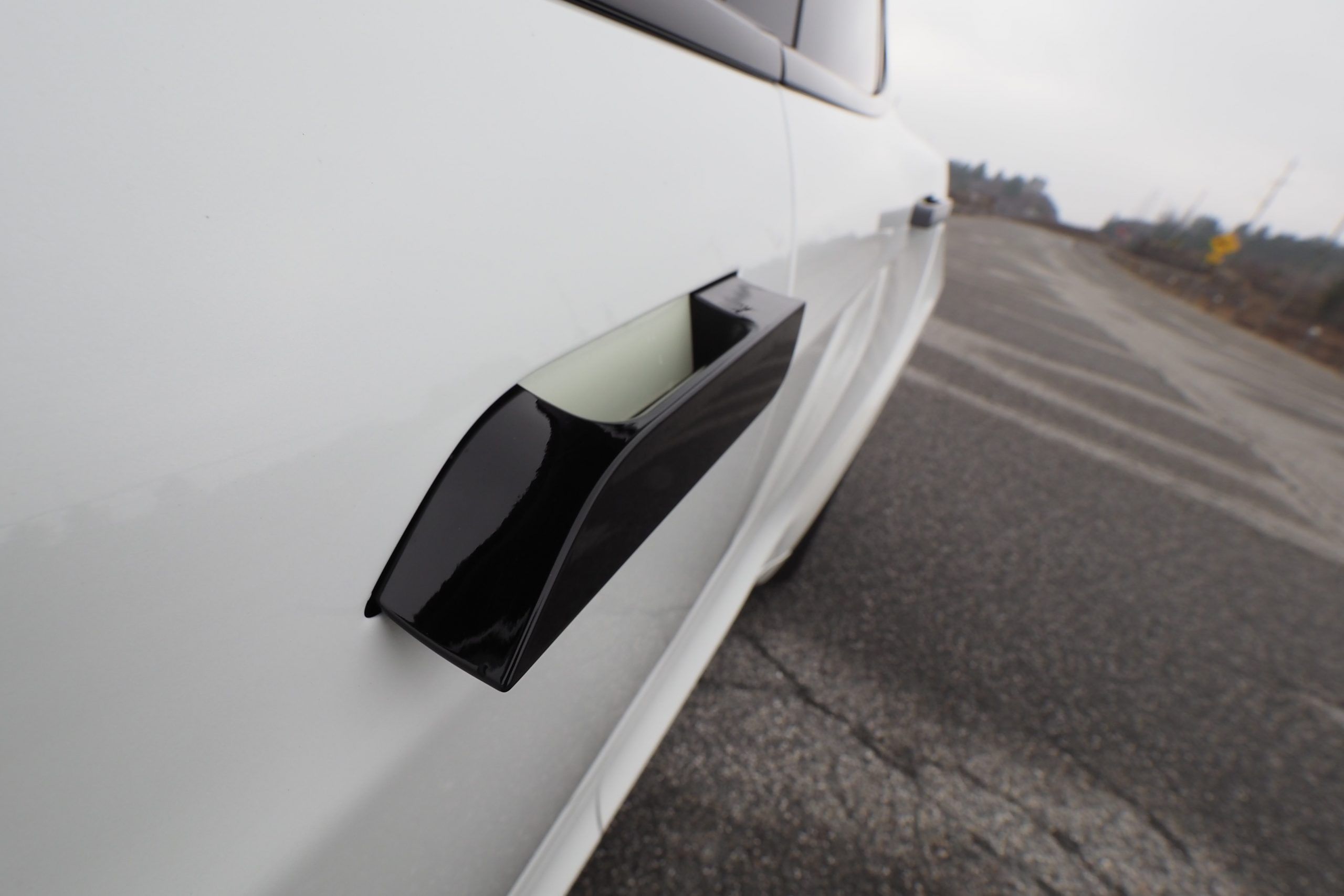 NHTSA investigating Tesla EV door handles that don't open | Driving