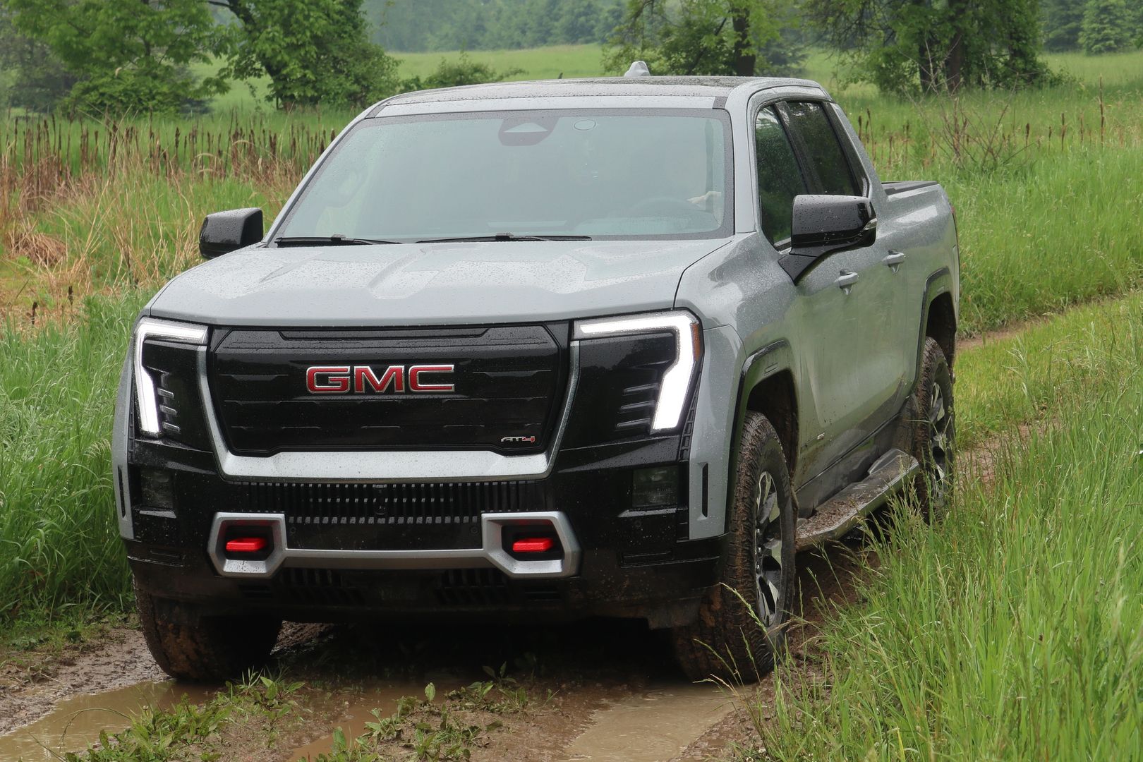 First Drive: Taking the 2026 GMC Sierra EV AT4 off-road - Reviews | Driving