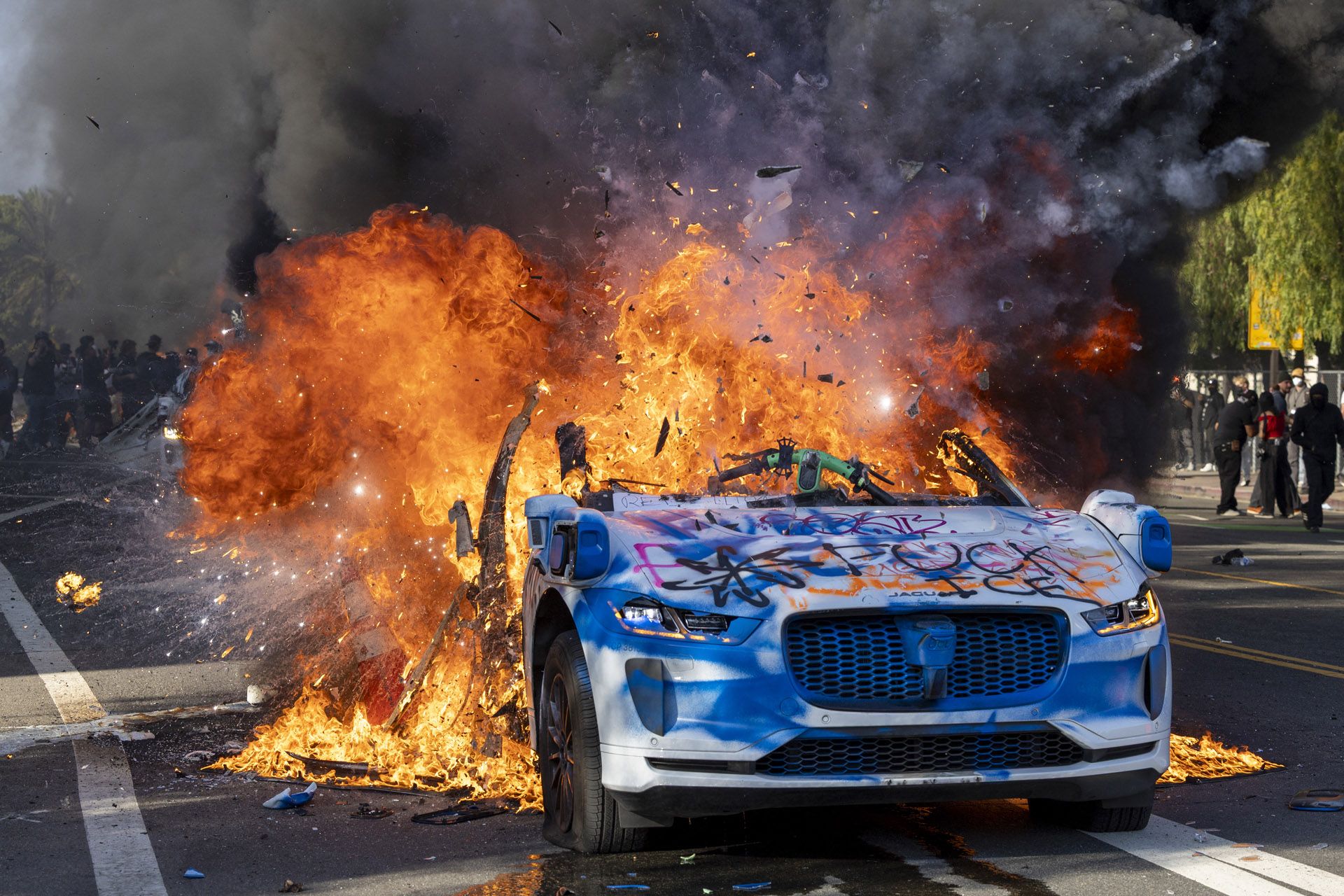 Waymo driverless cars destroyed in ongoing L.A. protests | Driving