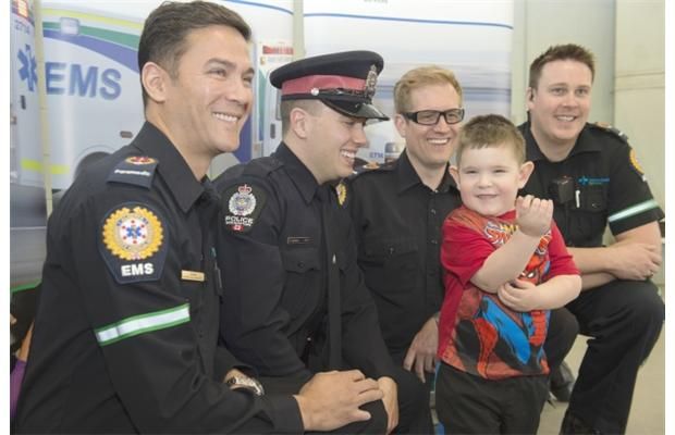 Young boy reunited with paramedics who saved his life | Edmonton Journal