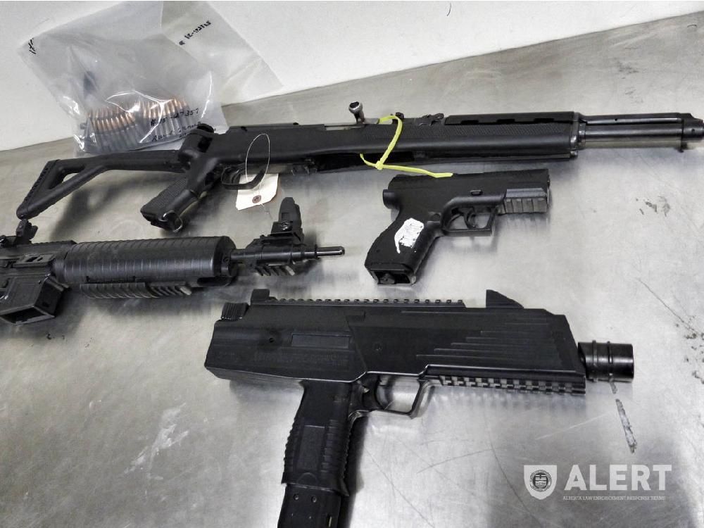 Semi-automatic carbine and replica firearms seized during raid west of ...