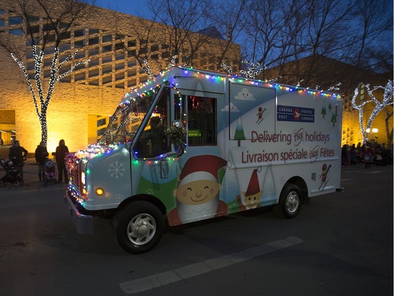 Edmonton's first outdoor Santa parade in decades draws crowds downtown ...