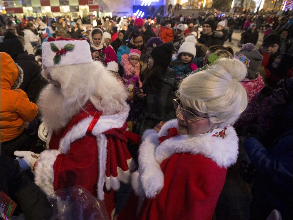 Edmonton's first outdoor Santa parade in decades draws crowds downtown ...