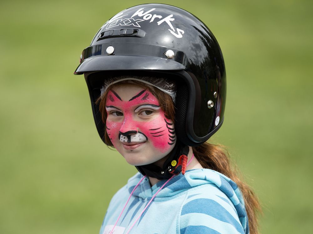 Kids go on a motorcycle adventure during Parade of Heroes at Edmonton's ...