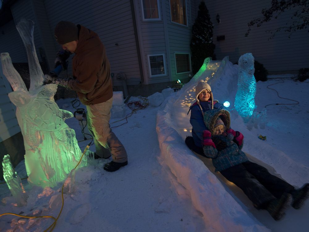 Ice carver builds slide with stockpiled blocks in Edmonton | Edmonton ...