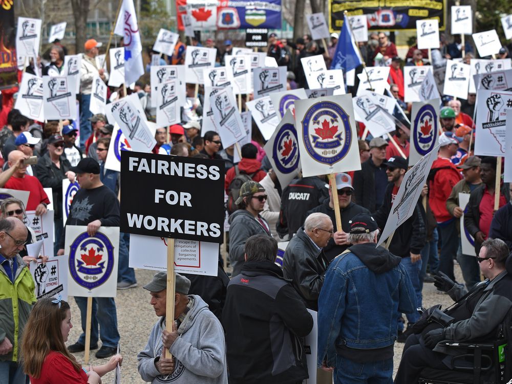 Hundreds rally at Alberta legislature for changes to labour code ...